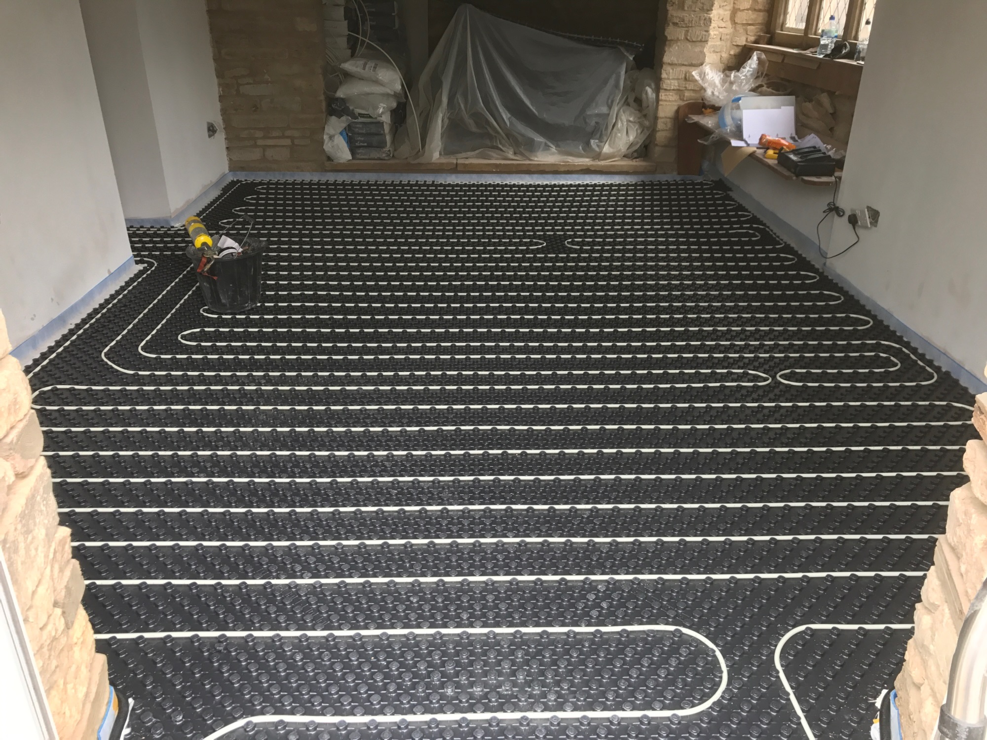 Multi-zone underfloor heating for an extended period property | Nu-Heat